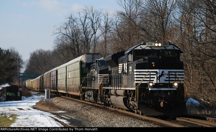 NS 290, consisting of loaded autoracks, heads east @ LEHL MP 68